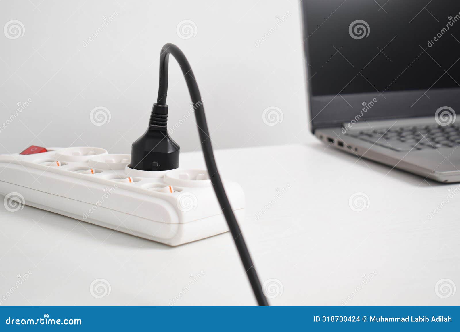 Electrical Plug in Outlet Socket at Home. Electric Plug, Power Cable ...