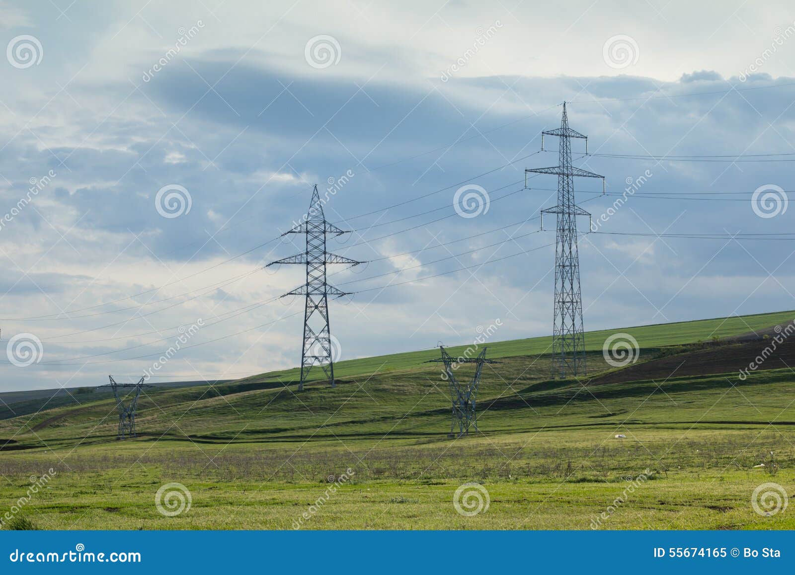 Electrical Poles in a Field Stock Image - Image of pasture, mountain ...