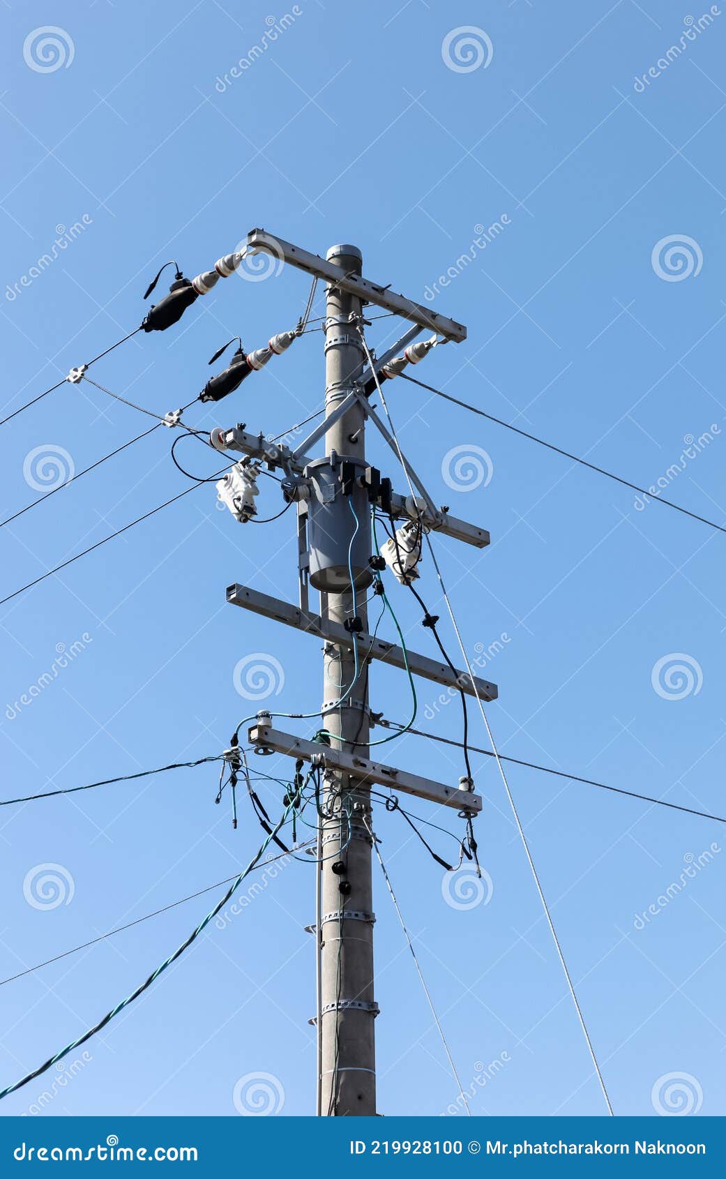 Electrical Post with Power Line Cables., Against Blue Sky Stock Photo ...