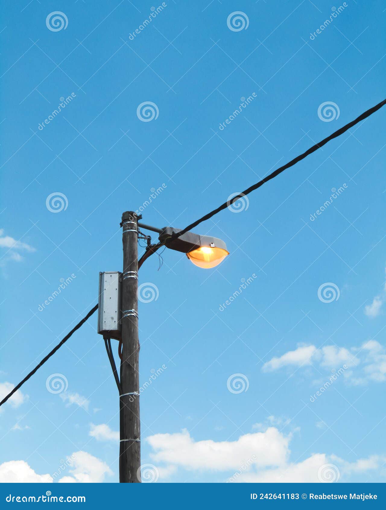 An Electrical Power Line and Streetlight Structure Stock Image - Image ...