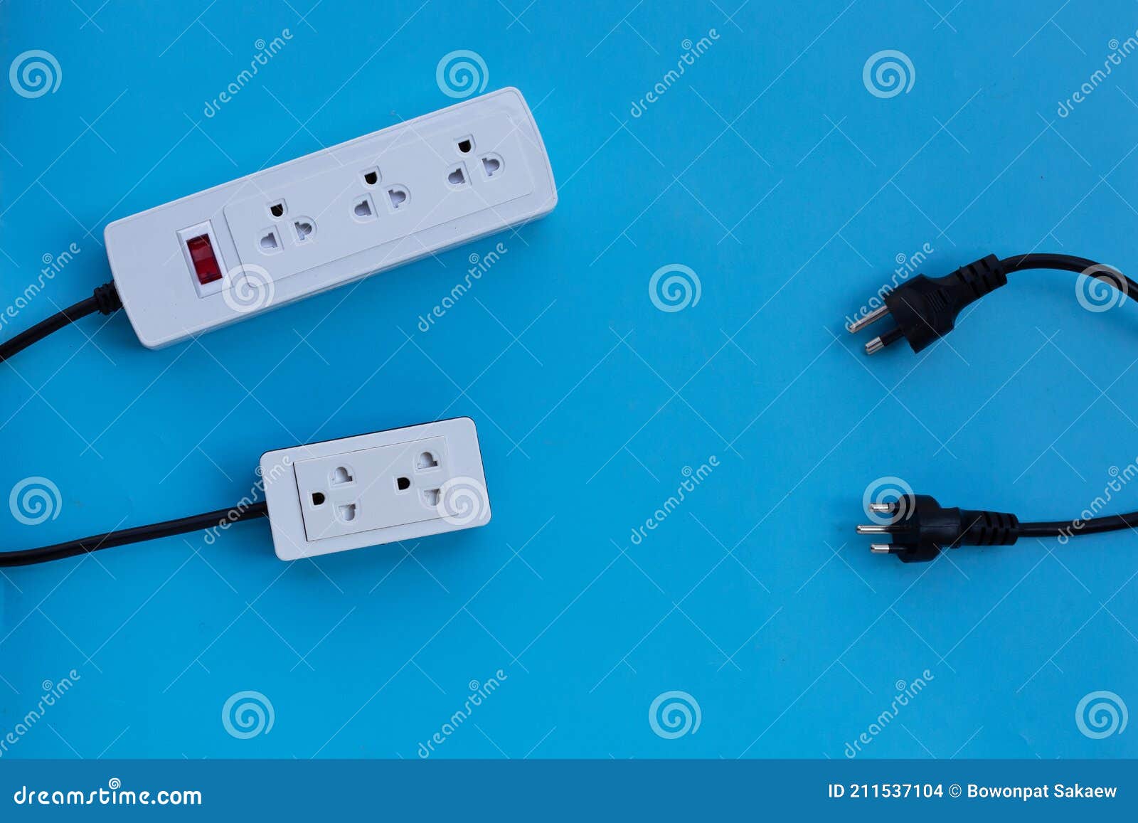 Electrical Power Strip and Plug on Blue. Top View Stock Photo - Image ...