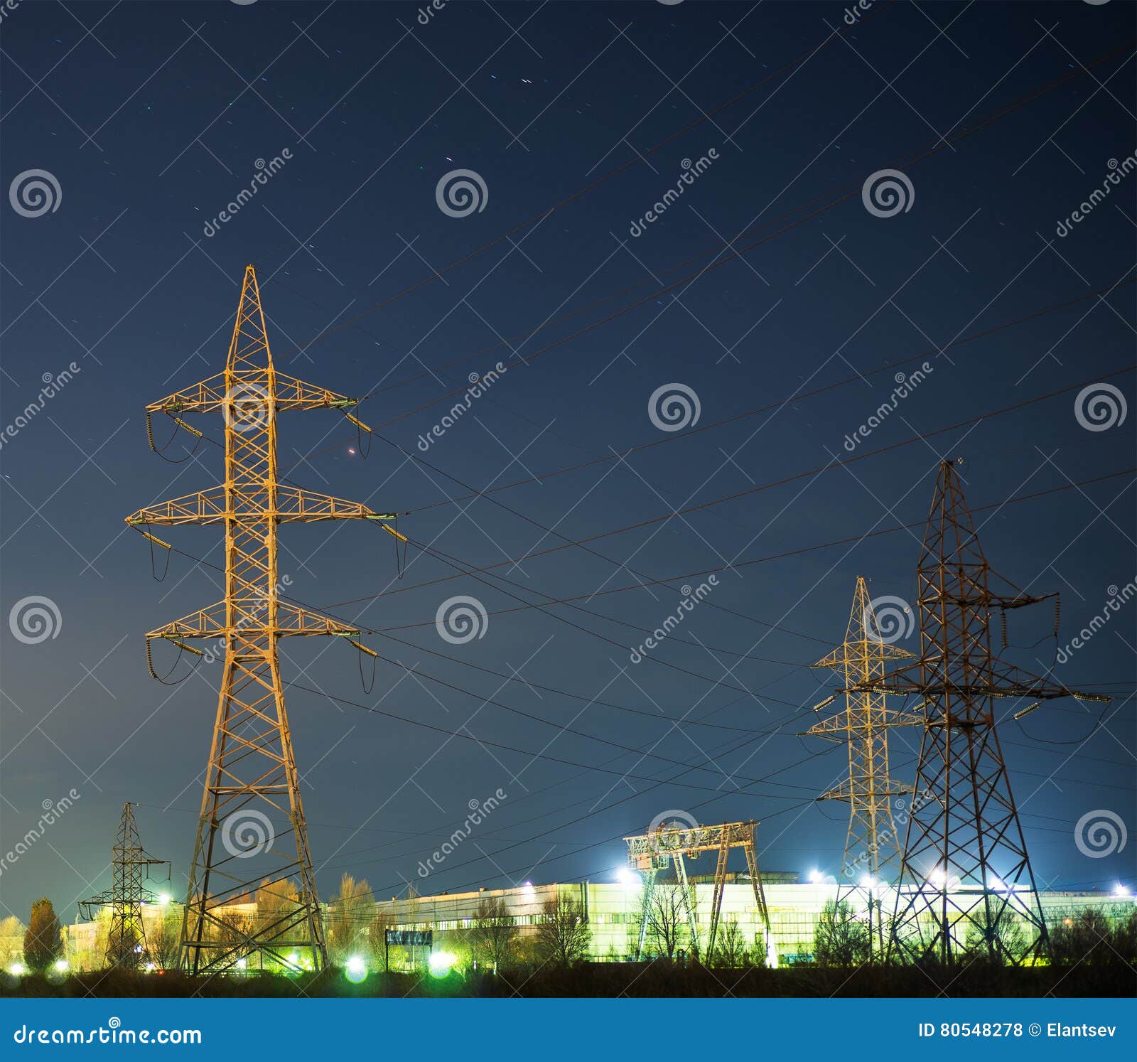 Electrical Pylon and High Voltage Power Lines at Night. Stock Photo ...