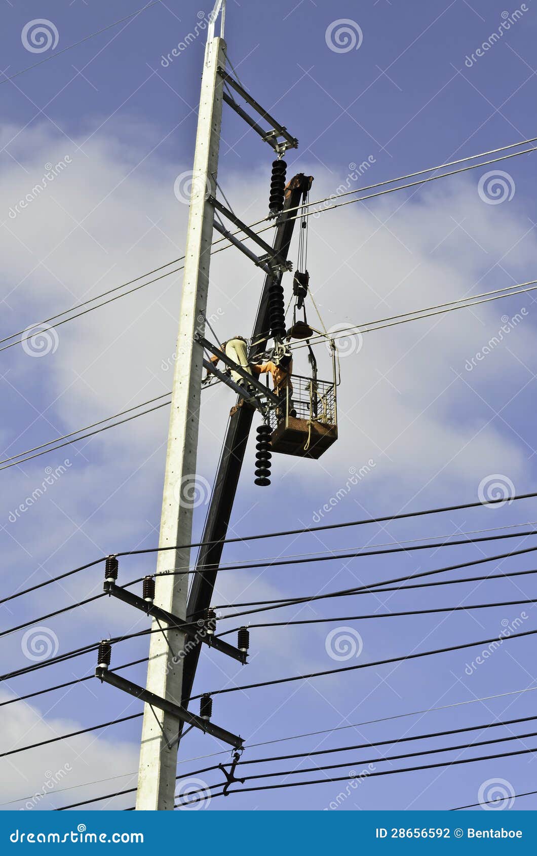 Electrical Repairs by Electricians on a Power Pole Stock Photo - Image ...