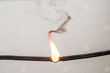 Electrical Short Circuit. Wiring Cable on Fire Flame Stock Photo ...