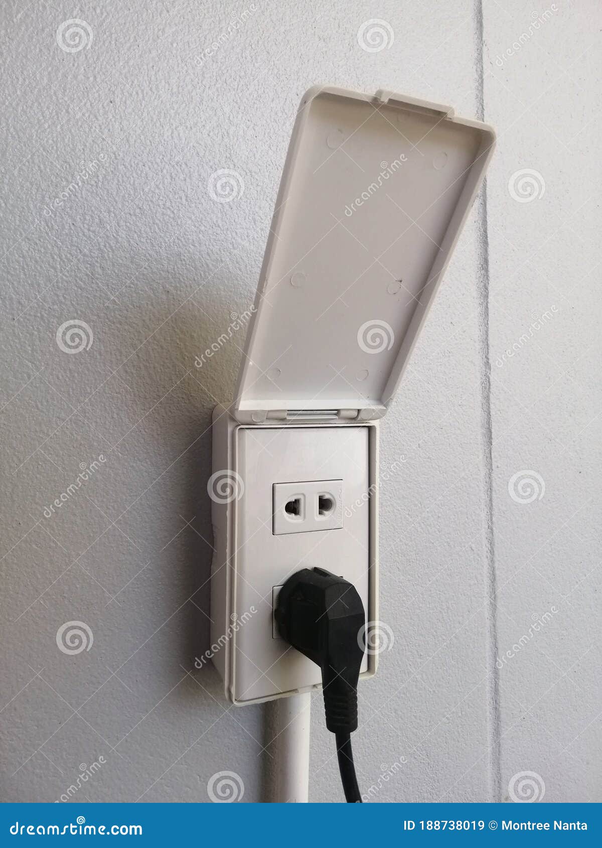 Electricity Socket Installed on White Concrete Wall, Light Switch on ...