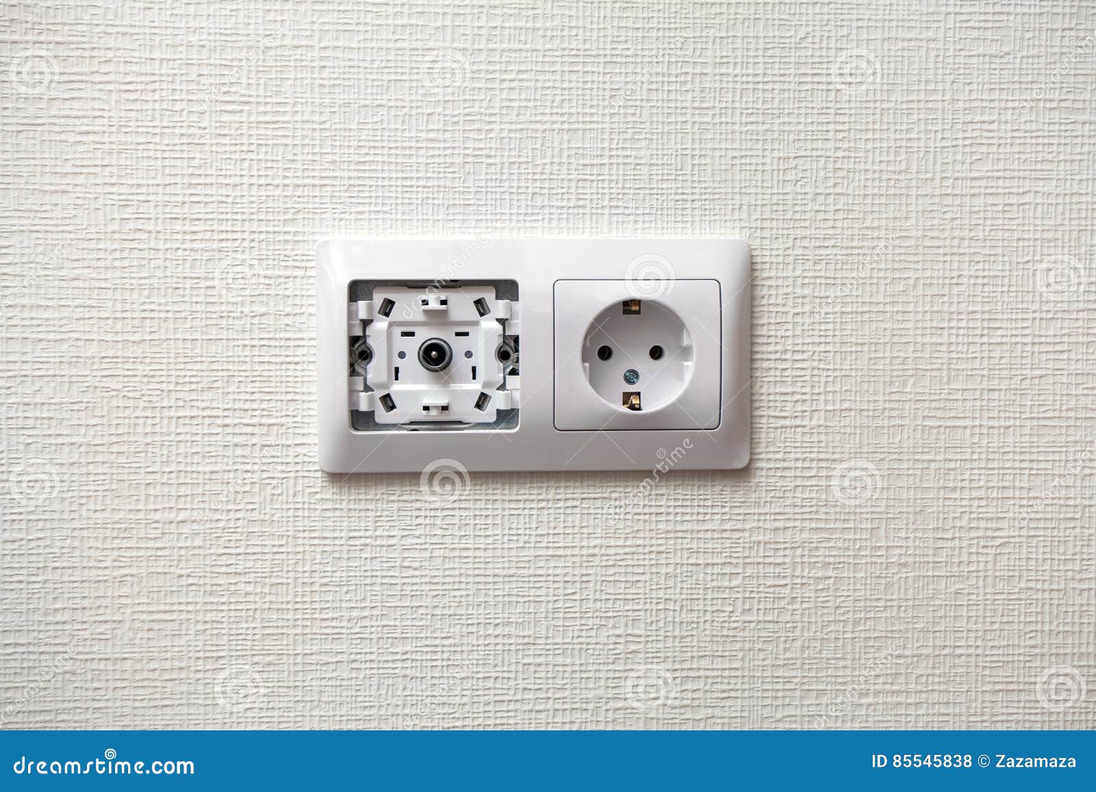 An Electrical Socket and TV Outlet on Wall Stock Photo - Image of ...