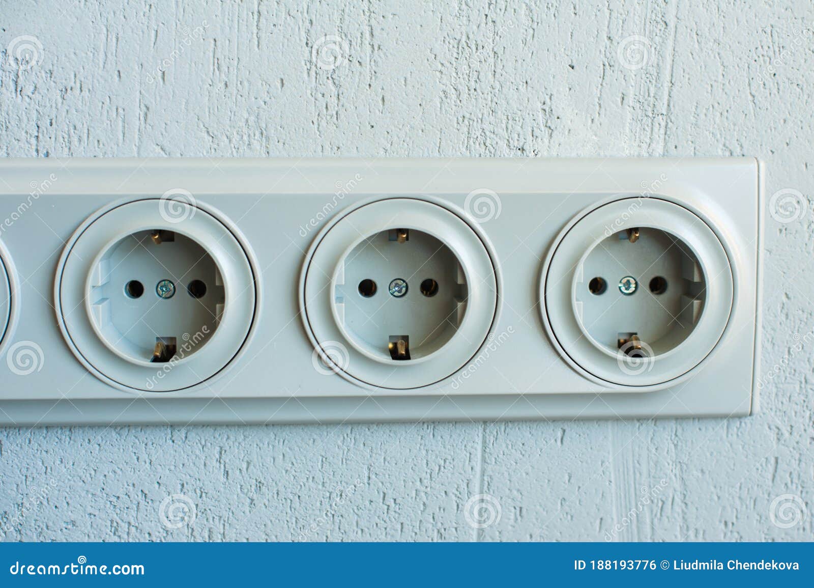 Electrical Sockets on a Gray Wall, Close-up Stock Photo - Image of ...