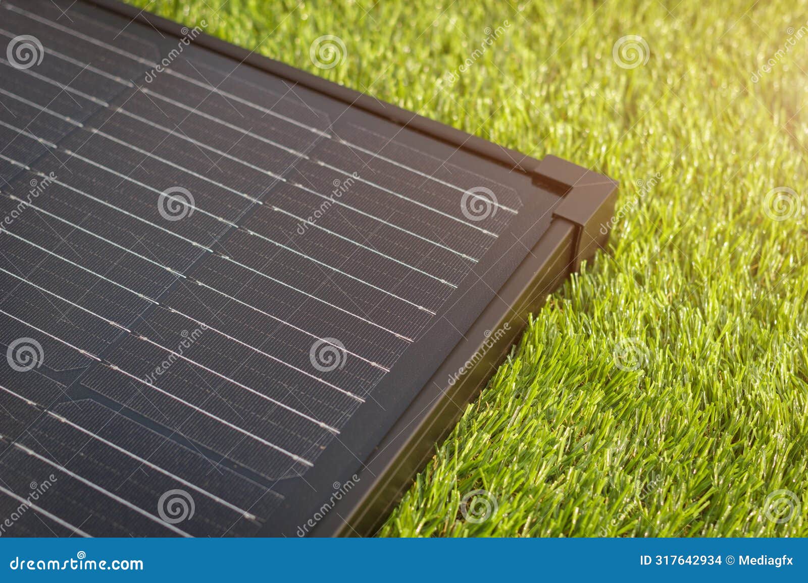 Electrical Solar Panel on the Green Grass with Sunlight Stock Photo ...