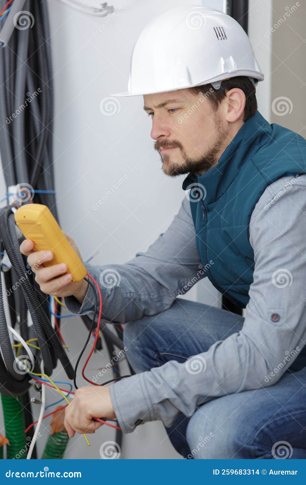 Electrical Student Checks Phase Rottation for High Voltage Cable Stock ...