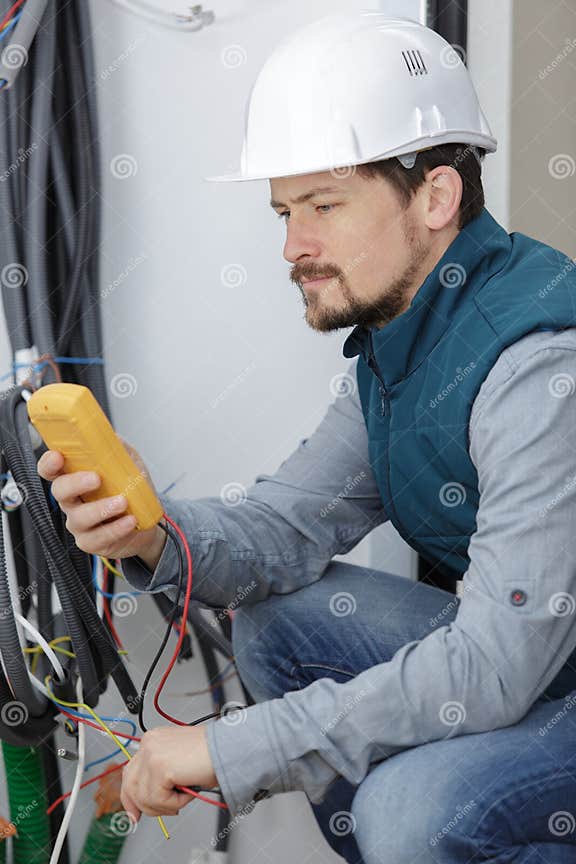Electrical Student Checks Phase Rottation for High Voltage Cable Stock ...