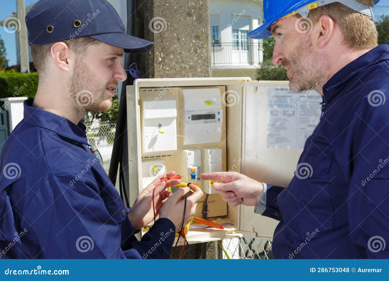 Electrical Technicians Testing Meter in Cabinet Stock Photo - Image of ...