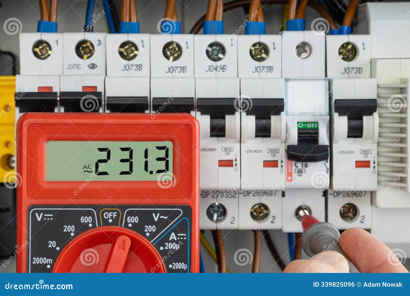 Electrical Testing with Multimeter in Breaker Panel Stock Photo - Image ...