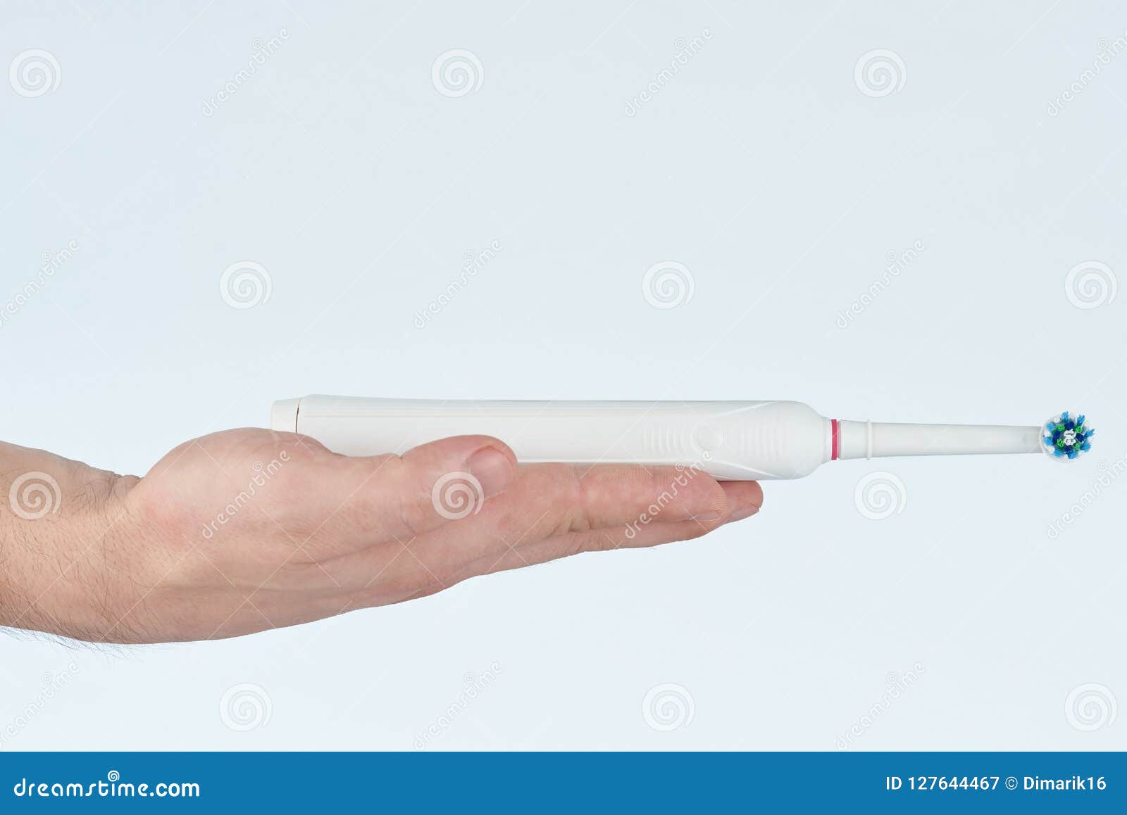 Electrical Toothbrush Lay on Hand Stock Image - Image of finger ...