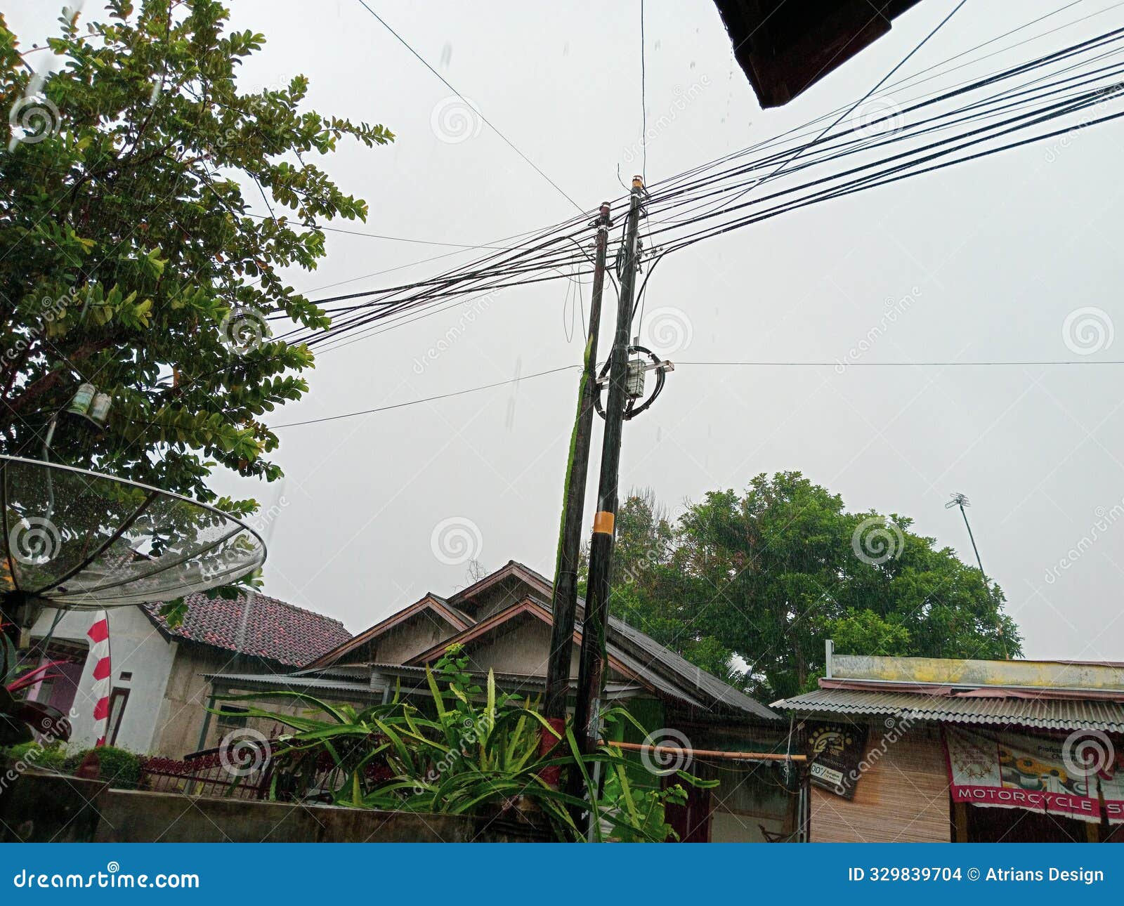 Electrical and WiFi Cables Piled Up on Two Poles are a Sight Every Day ...