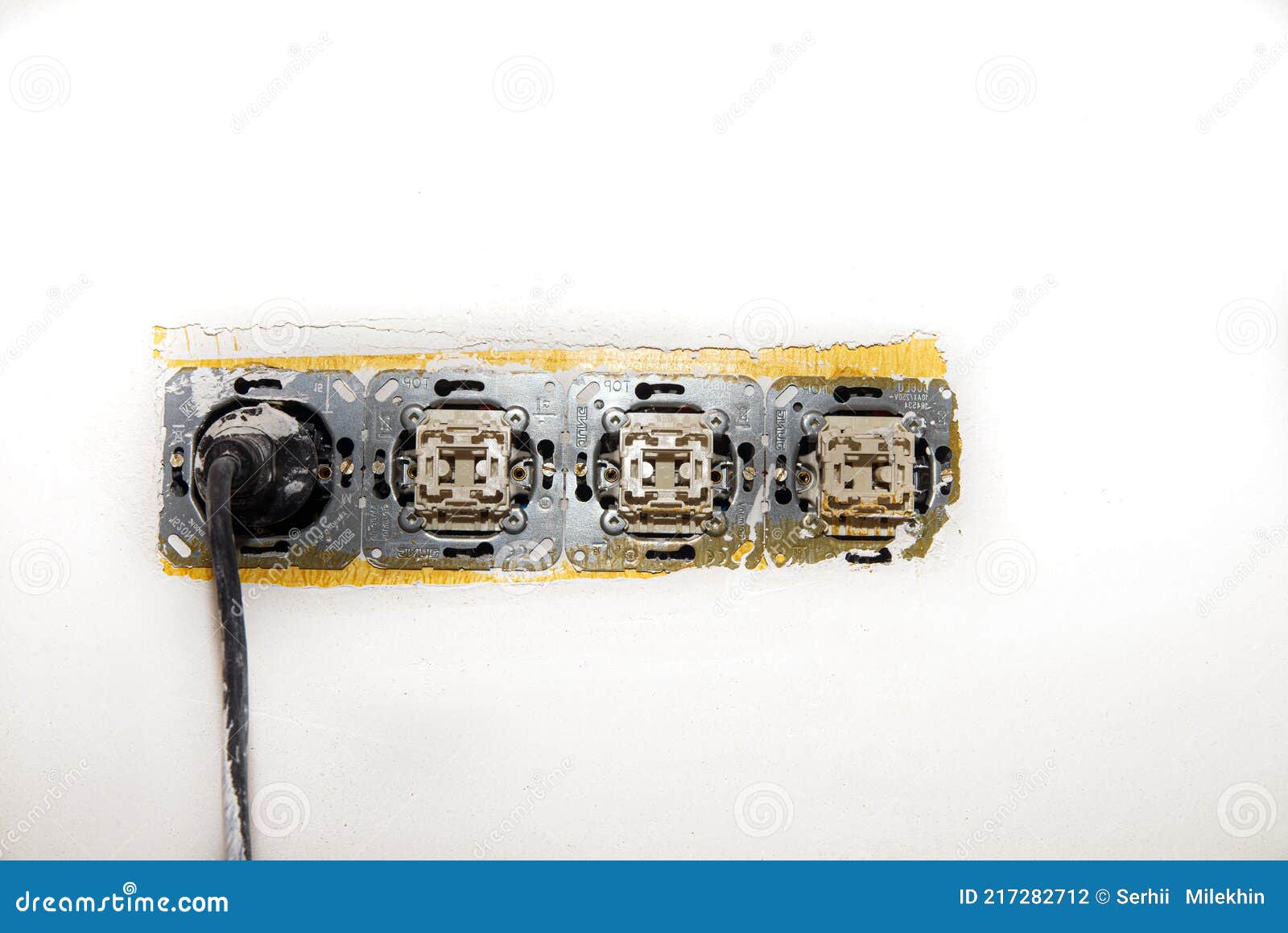 Electrical Wire and Opened Plug Socket on the Old Plastering Wall Stock ...