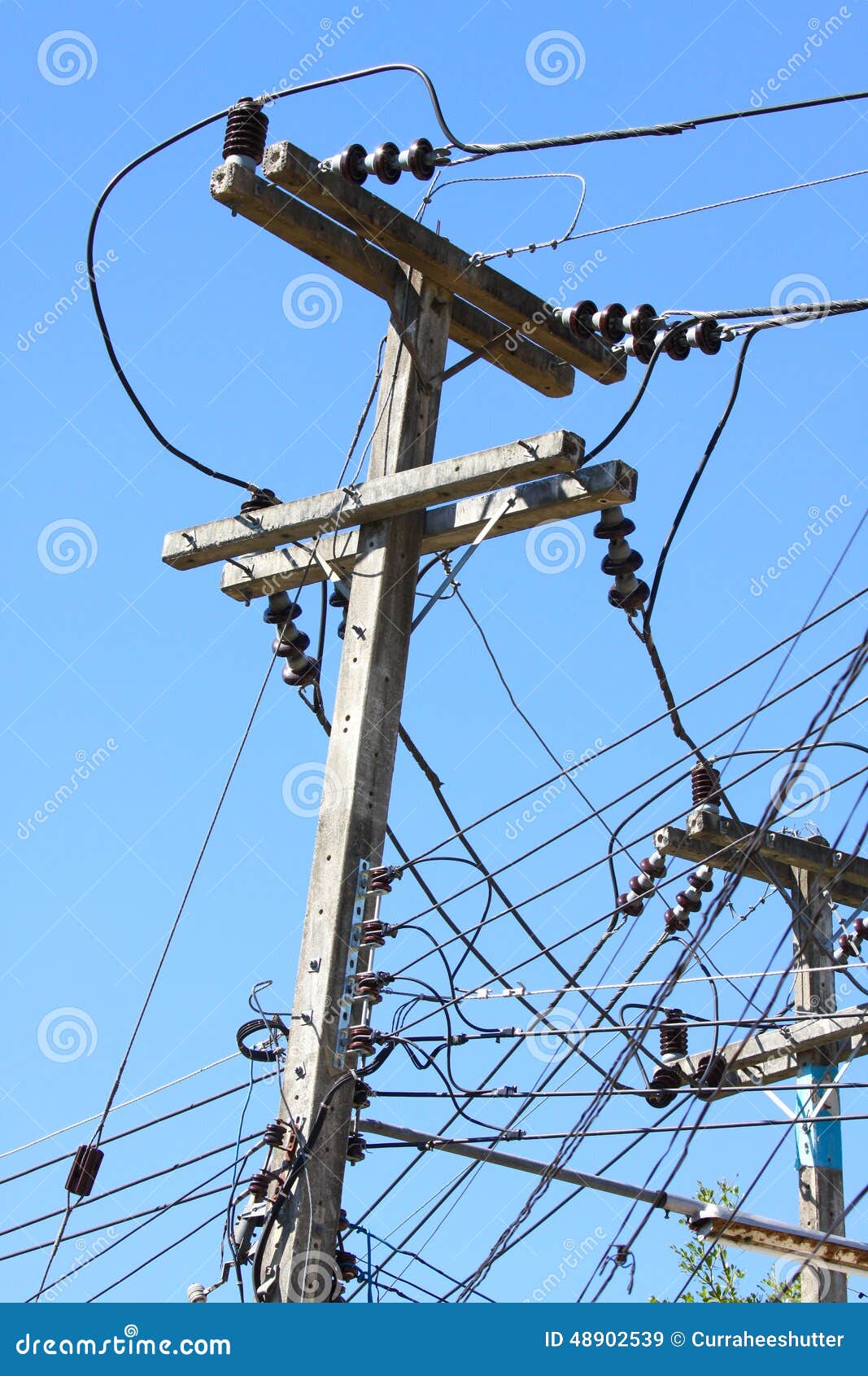 Electrical Wire on Pole. Chaotic Wire with Nest on Pole and Blue Sky ...