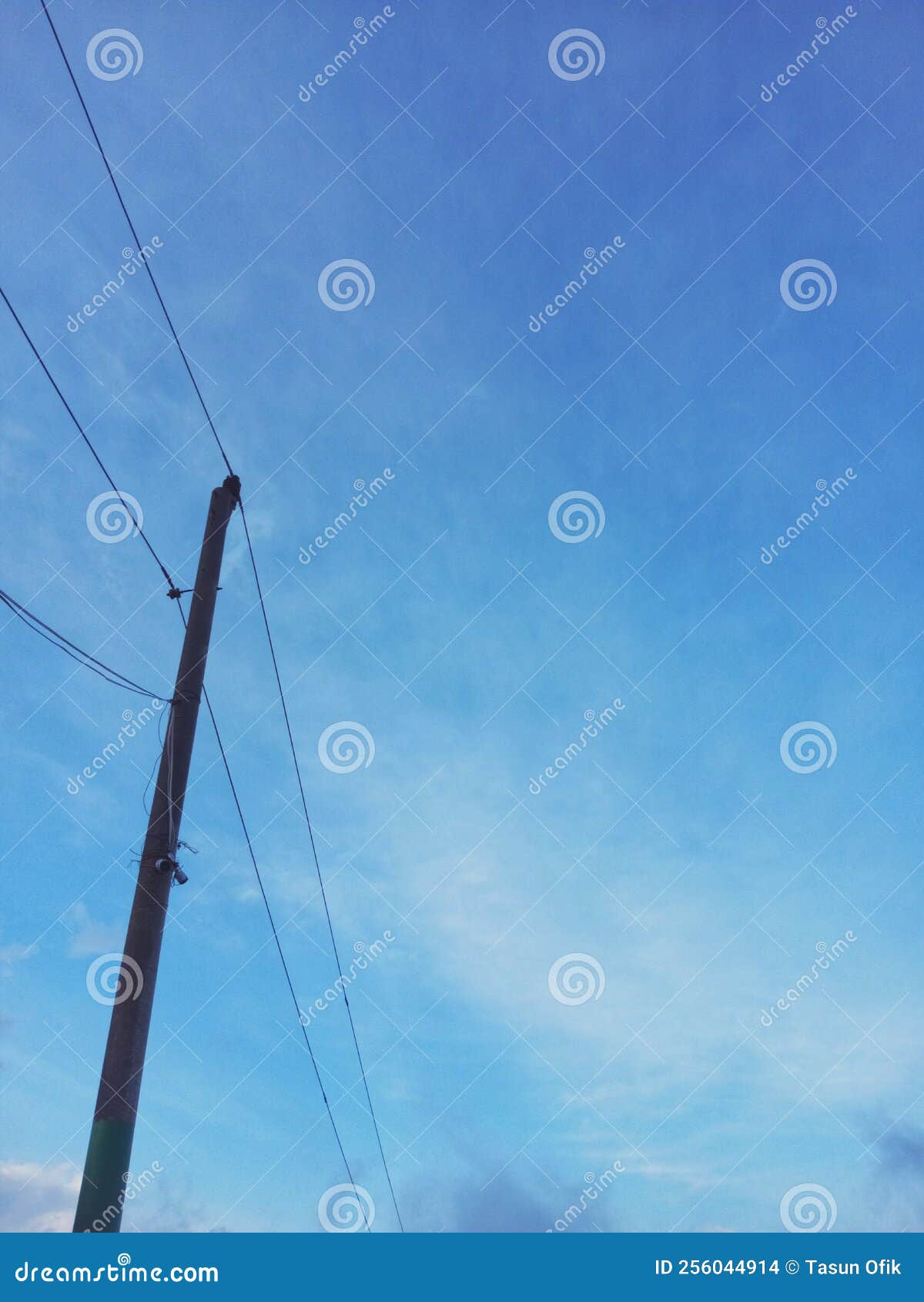 Electrical Wires on a Blue Cloud Background. Stock Photo - Image of ...