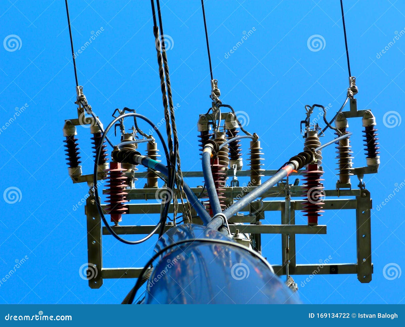Vertically Dropping Electrical Cables Concrete Pole. Clear Blue Sky ...