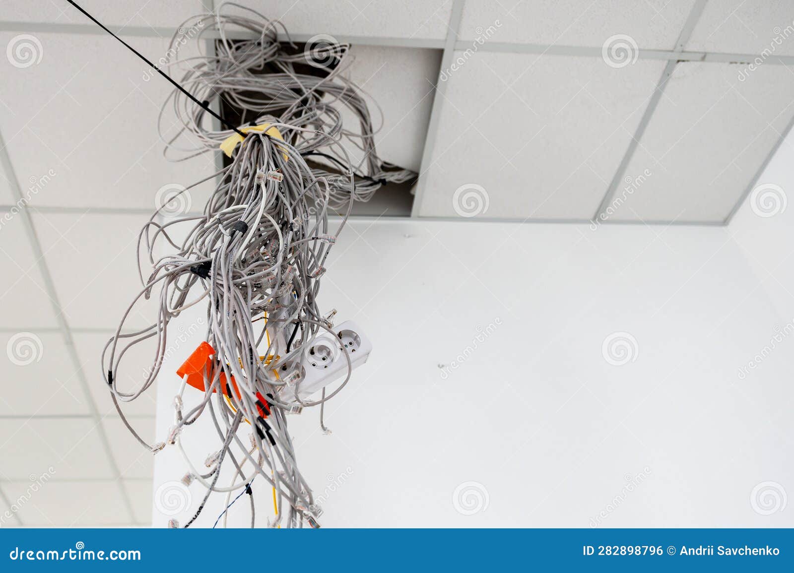 Electrical Wires Hanging from the Ceiling. Cables Hanging from Ceiling ...