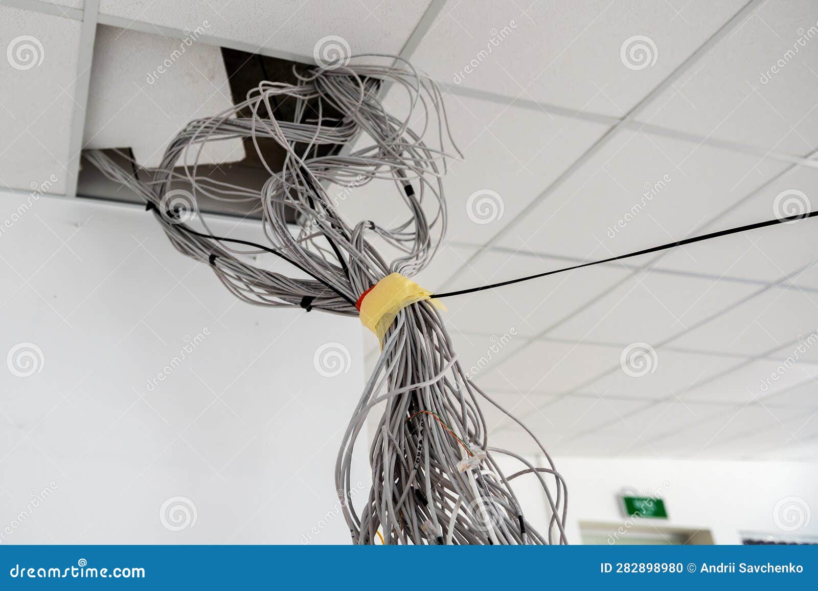 Electrical Wires Hanging from the Ceiling. Cables Hanging from Ceiling ...