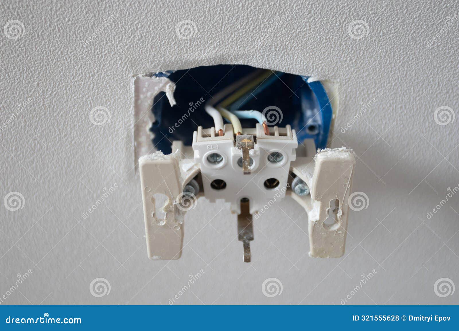 Electrical Wires Sticking Out from Electrical Socket Hole Stock Photo ...
