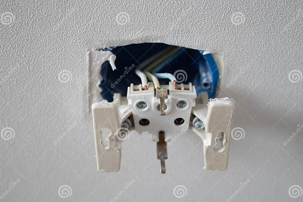 Electrical Wires Sticking Out from Electrical Socket Hole Stock Photo ...