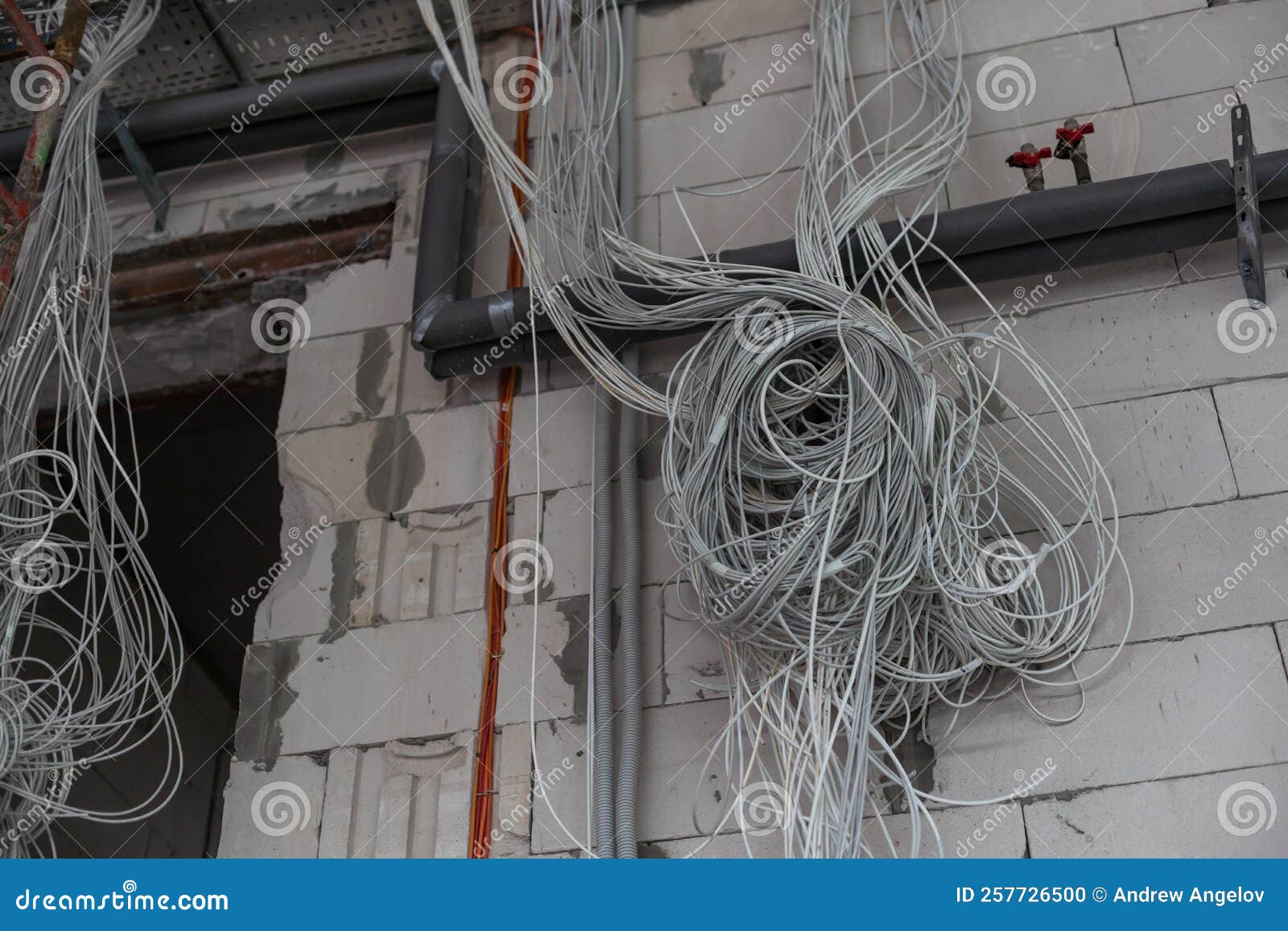Electrical Wiring Work at a Construction Site. Wire Extension. Stock ...