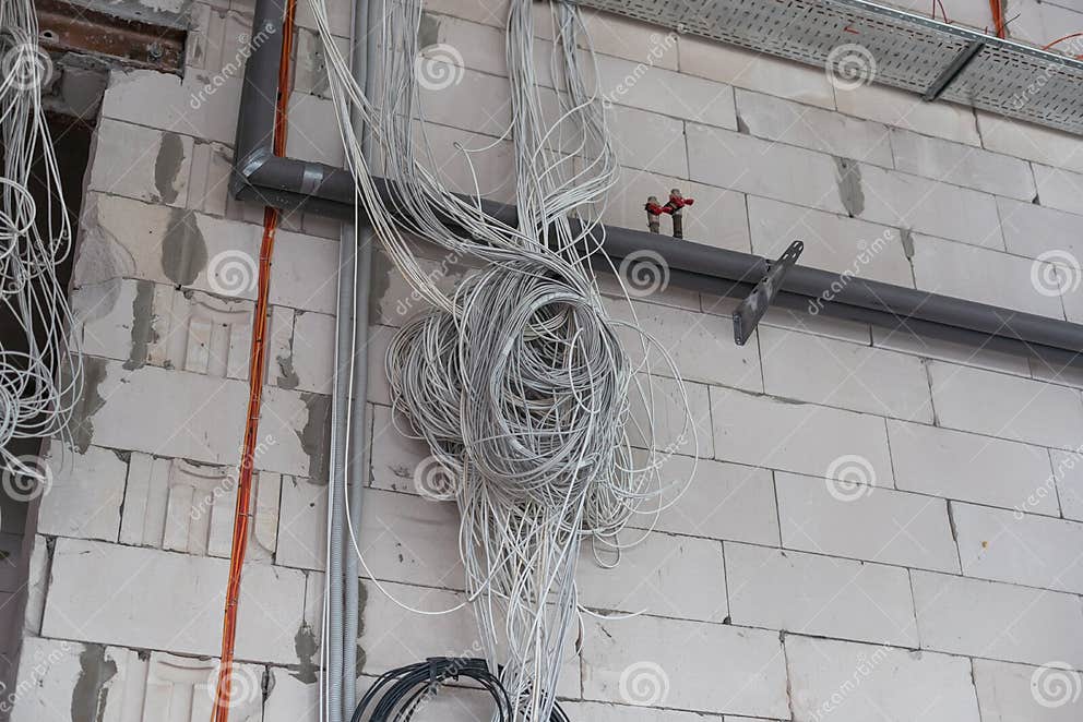 Electrical Wiring Work at a Construction Site. Wire Extension. Stock ...