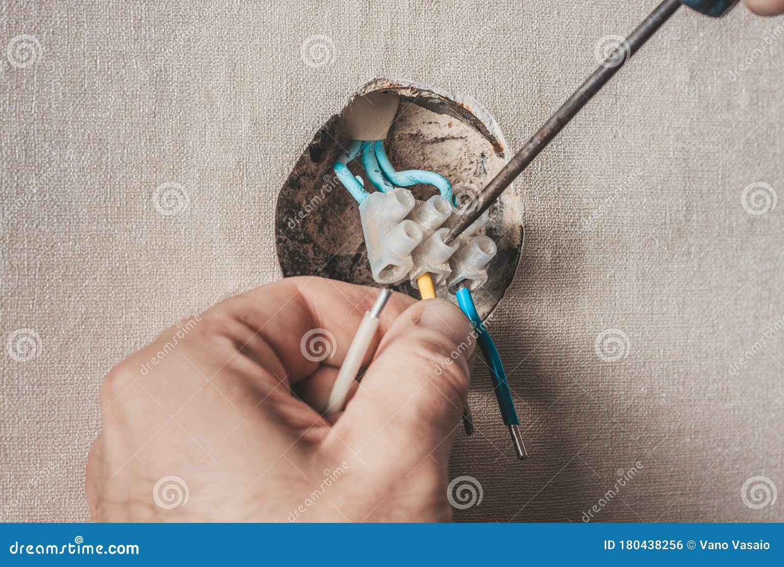 Electrician Connects The Sockets To The Electrical Wires. Installation ...