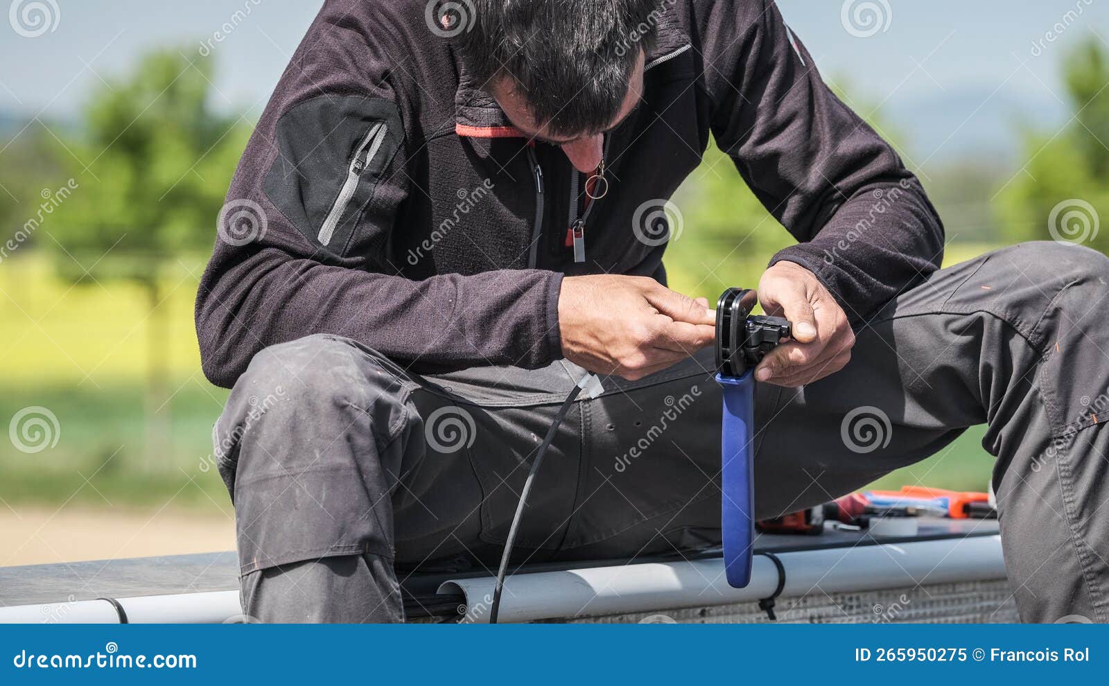 Electrical Worker Preparing Electrical Connection Cables for Solar ...