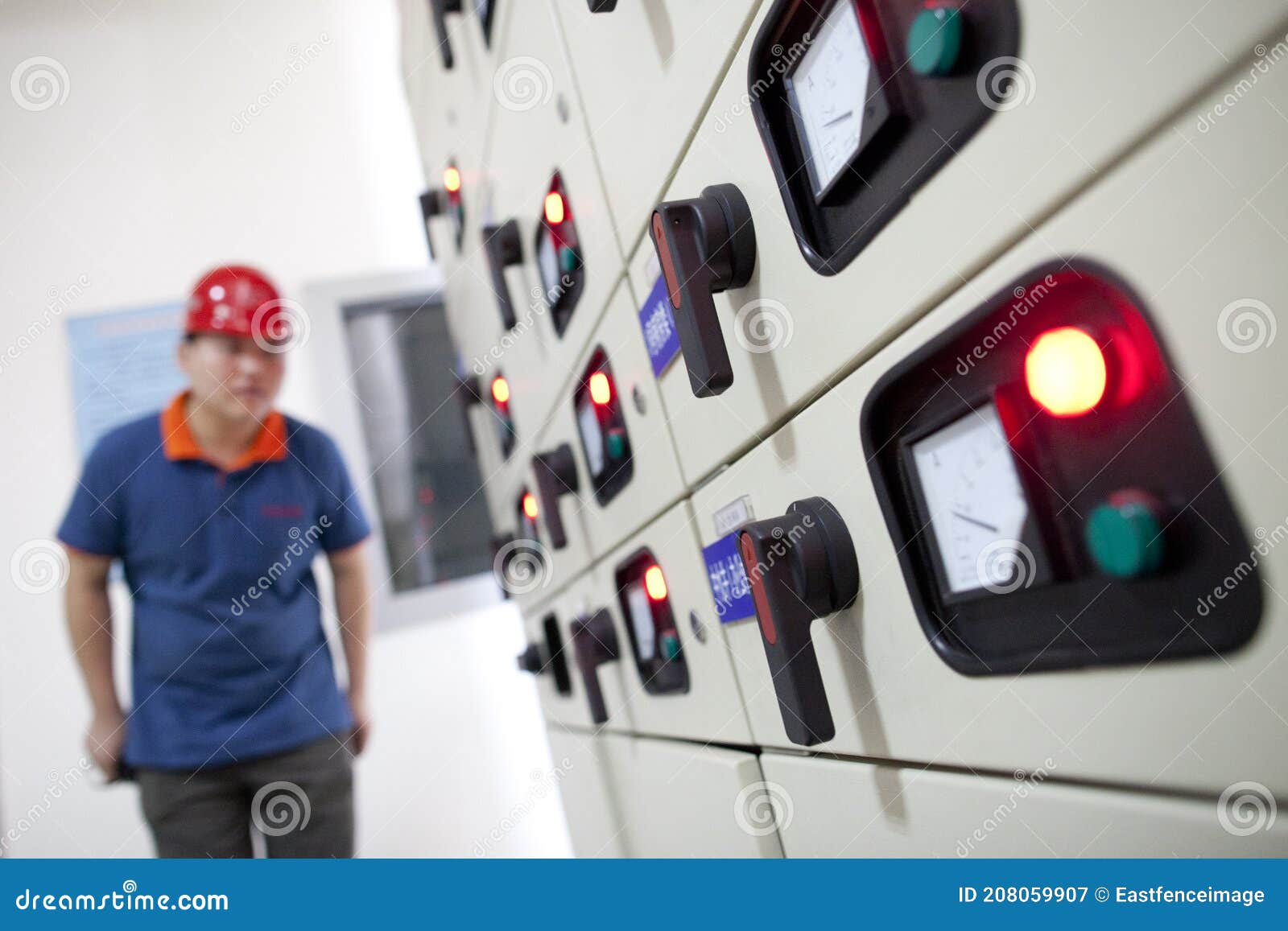 Electrical Worker Surveillance the Electricity Dial in the Control Room ...