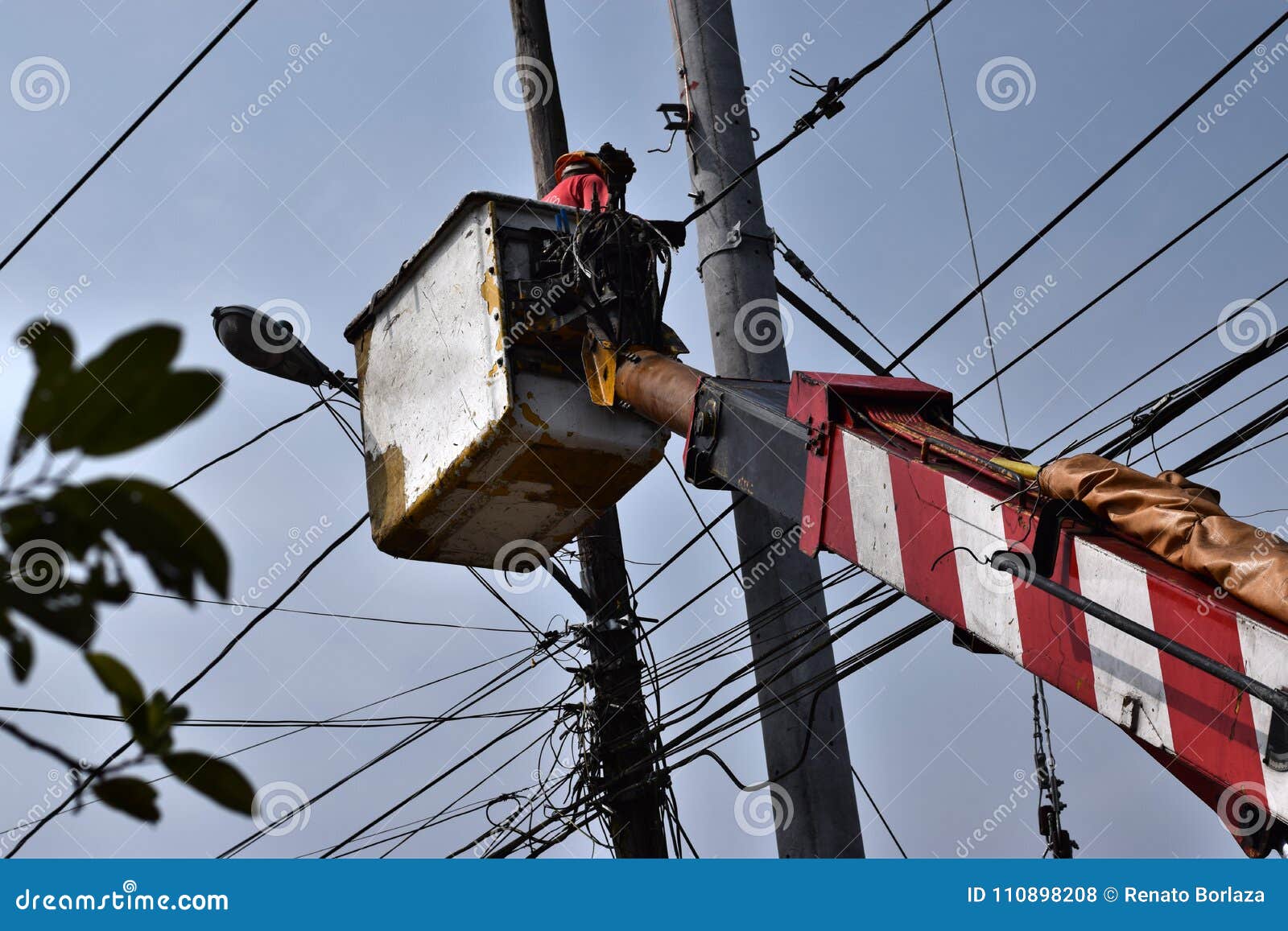 Electrical Workers on Telehandler with Bucket Installing High Tension ...