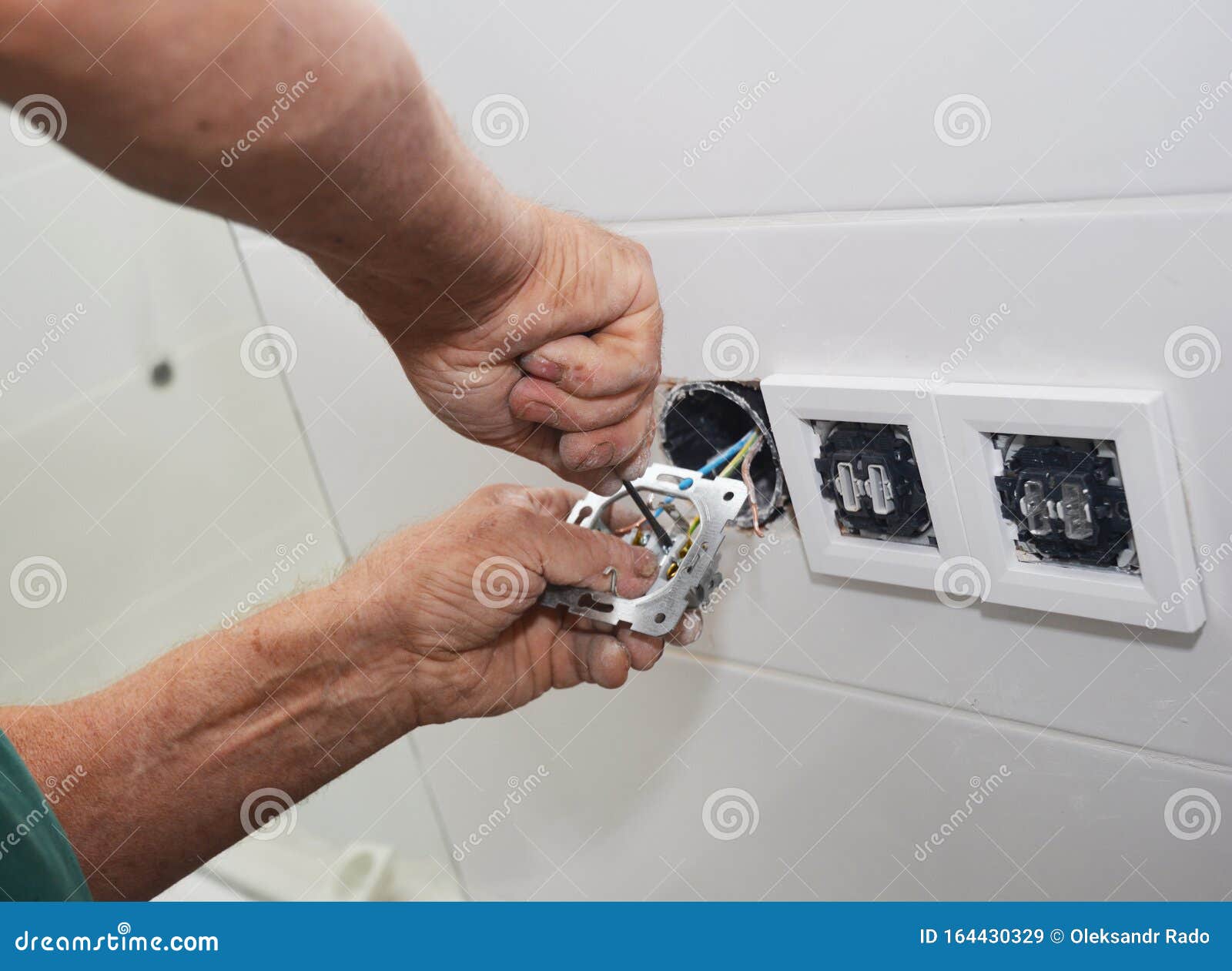 Electrican Repair and Install Socket, Outlet Plug and Switch Stock ...