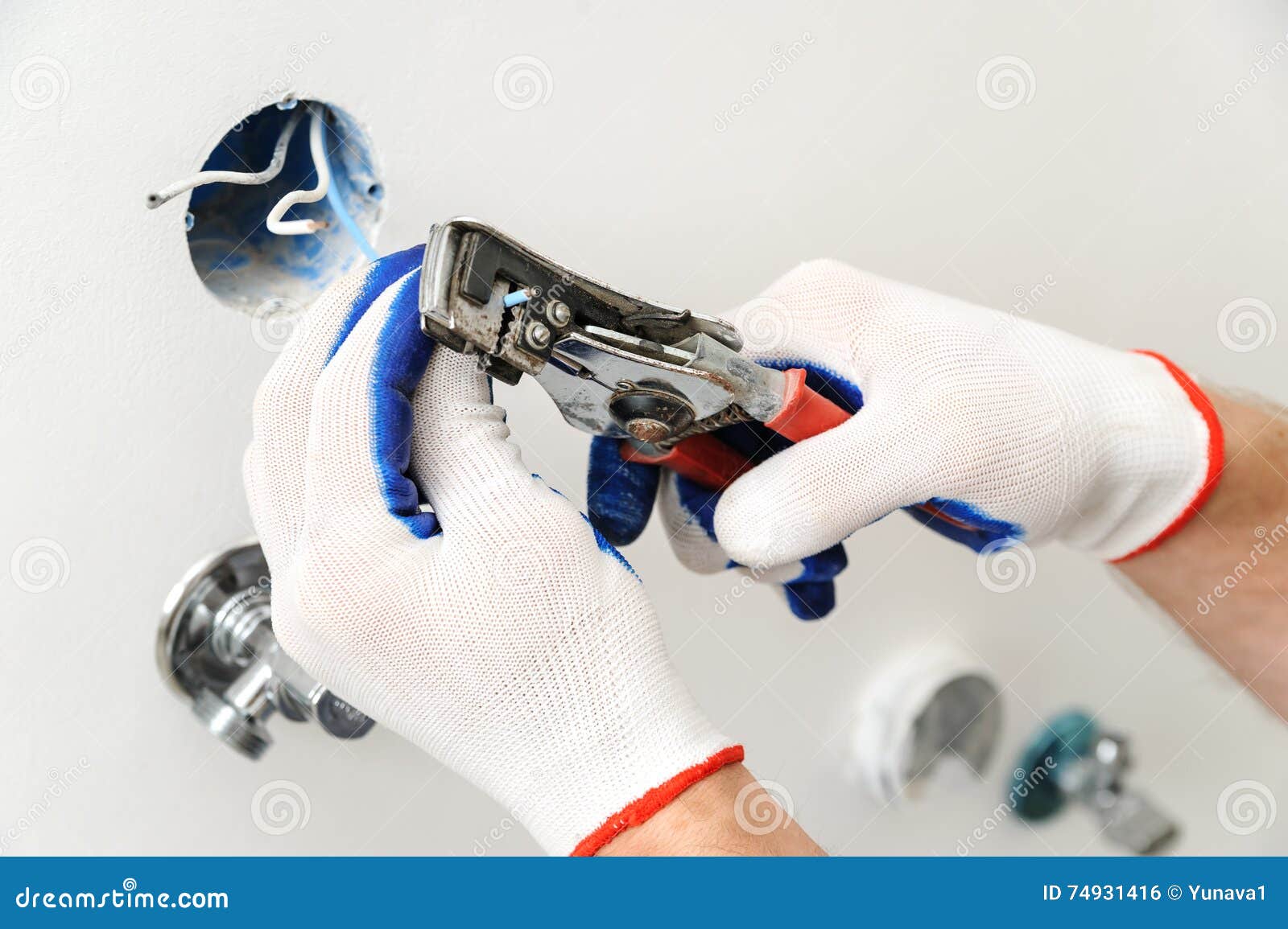 Electrican Stripping Insulation from Wire. Stock Photo - Image of ...