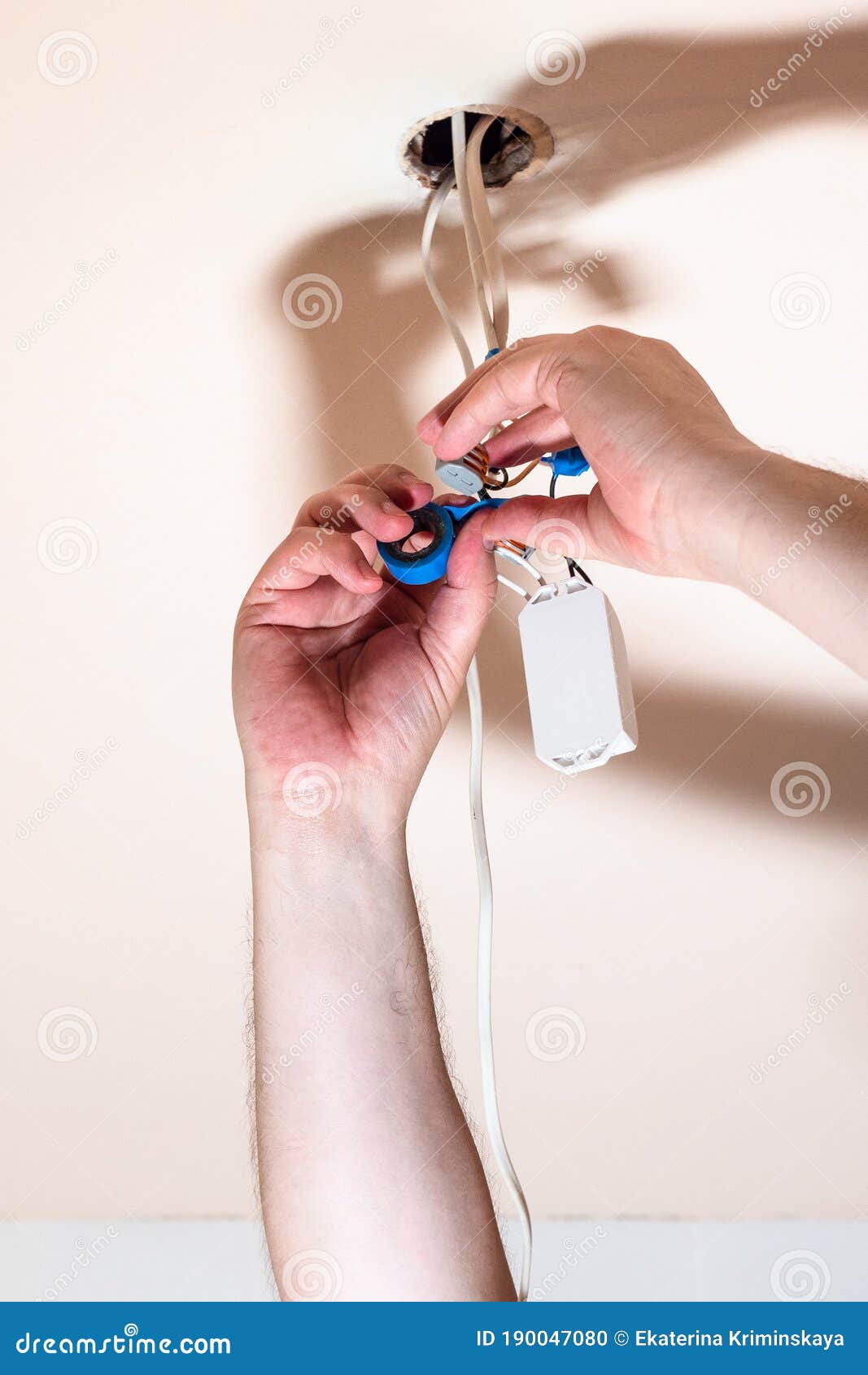 Electrician Assembles Electrical Wiring for Lamp Stock Photo - Image of ...