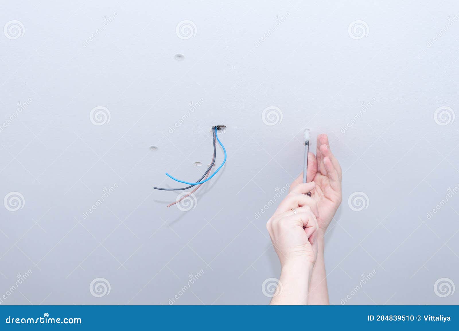 Electrician Assembles Electrical Wiring for Lamp Stock Photo - Image of ...