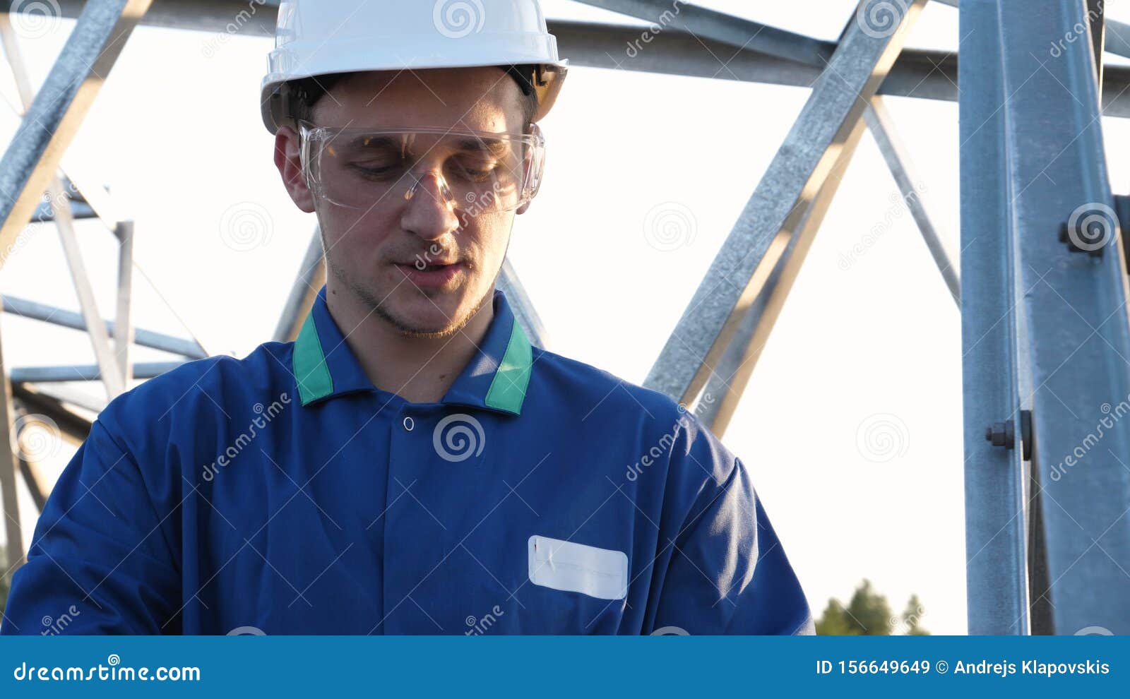 An Electrician or Builder and Engineer, in a Blue Robe, in a Yellow and ...