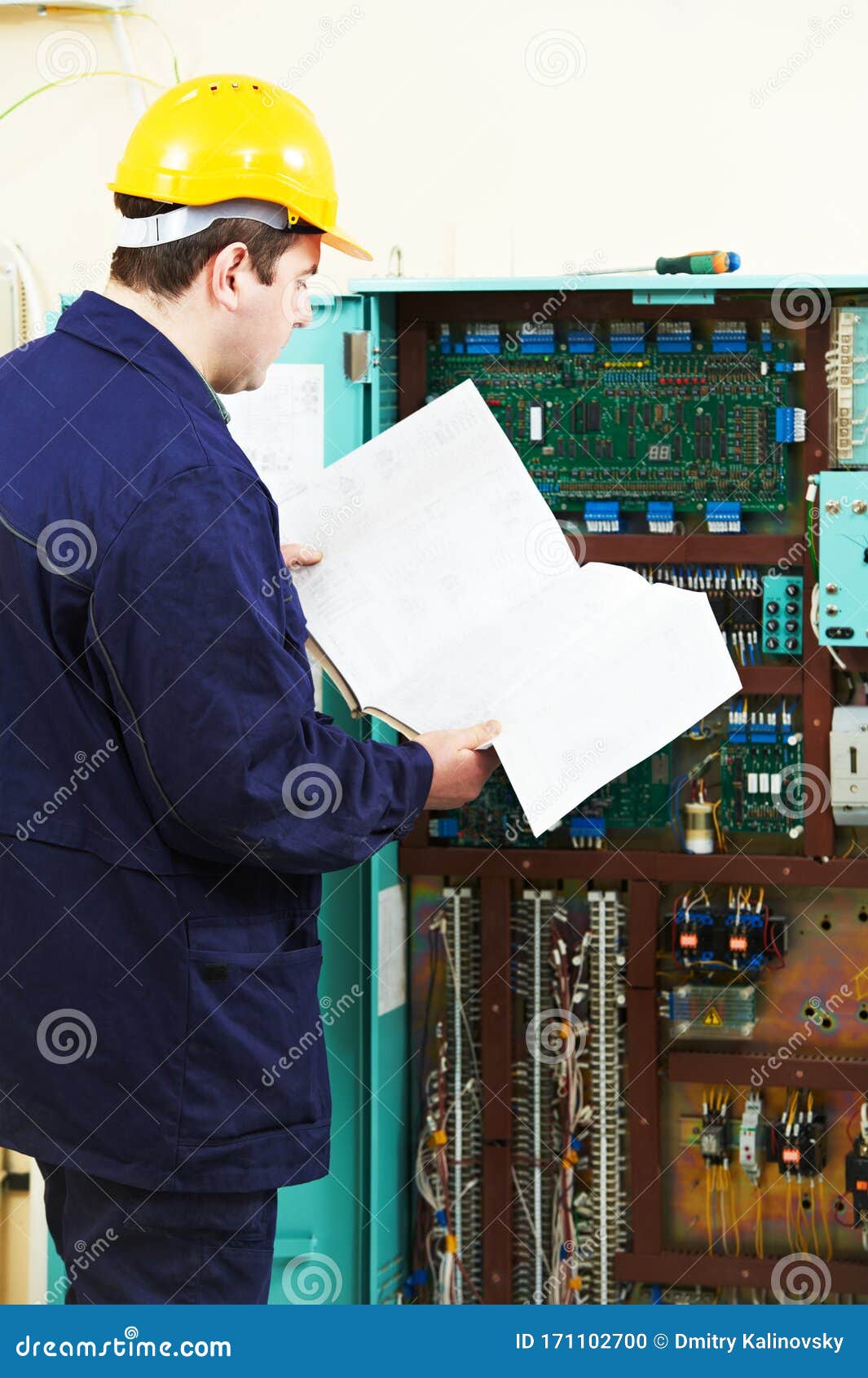 Electrician Builder Engineer Worker Testing Electronics in Lift Switch ...