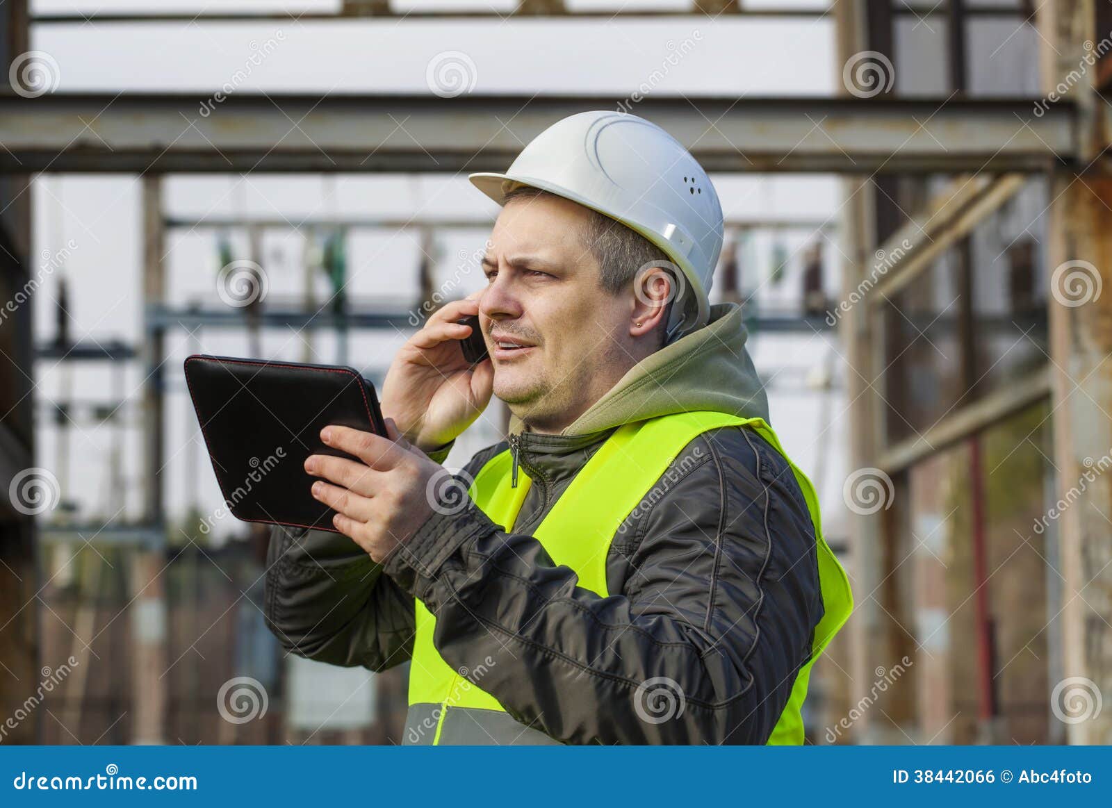 Electrician with Cell Phone Stock Photo - Image of professional ...