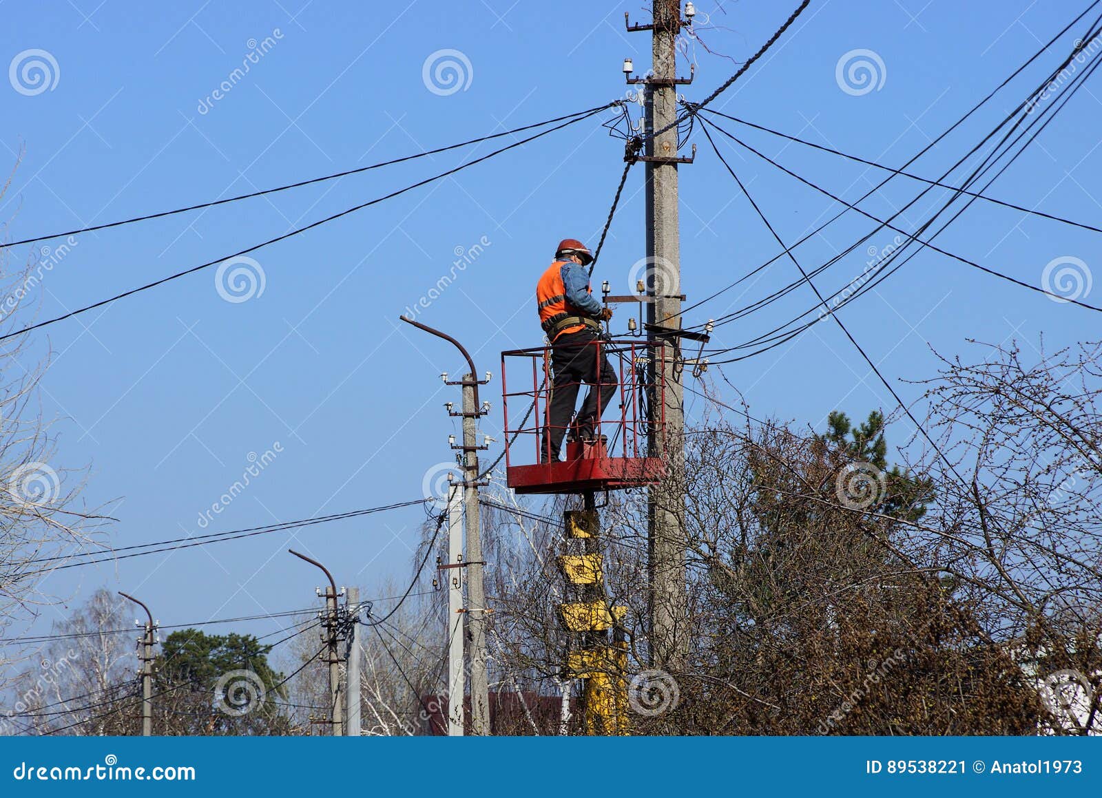 The Electrician is Changing the Wires on the Pole Editorial Photo ...