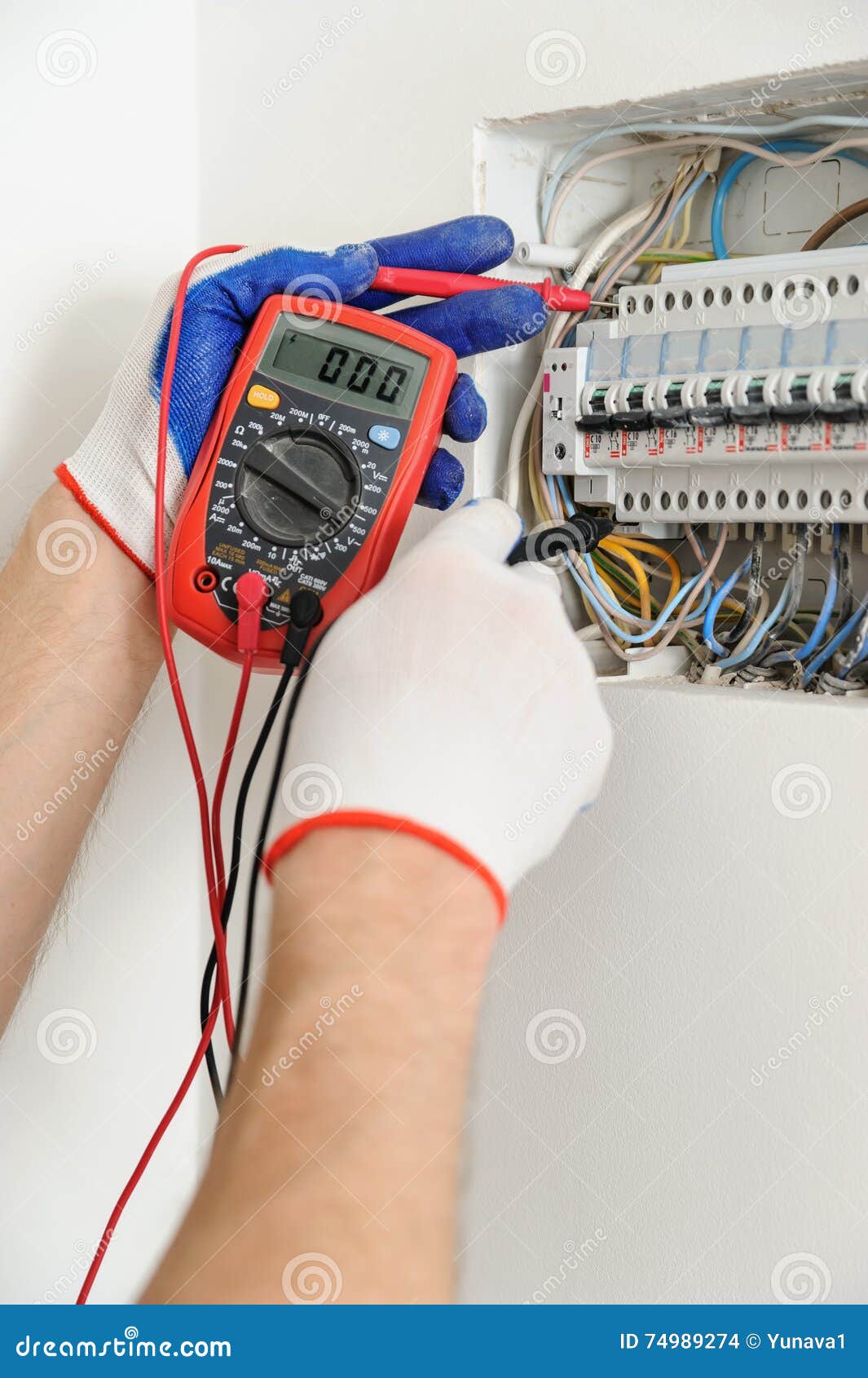 Electrician Check Voltage in Electrical Fuse Box. Stock Photo - Image ...
