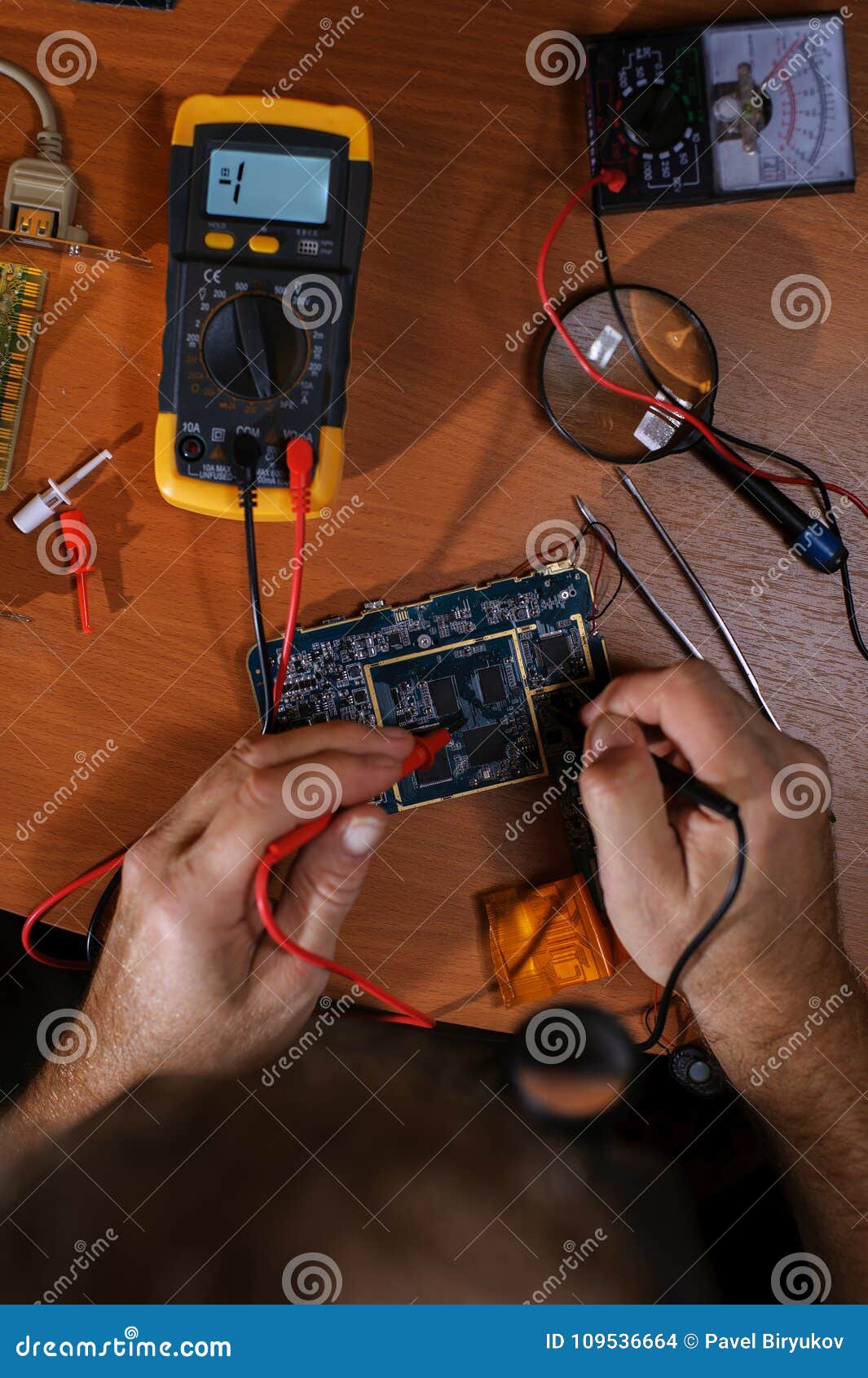 Electrician Checking Circuit Board with Multimeter Stock Photo - Image ...