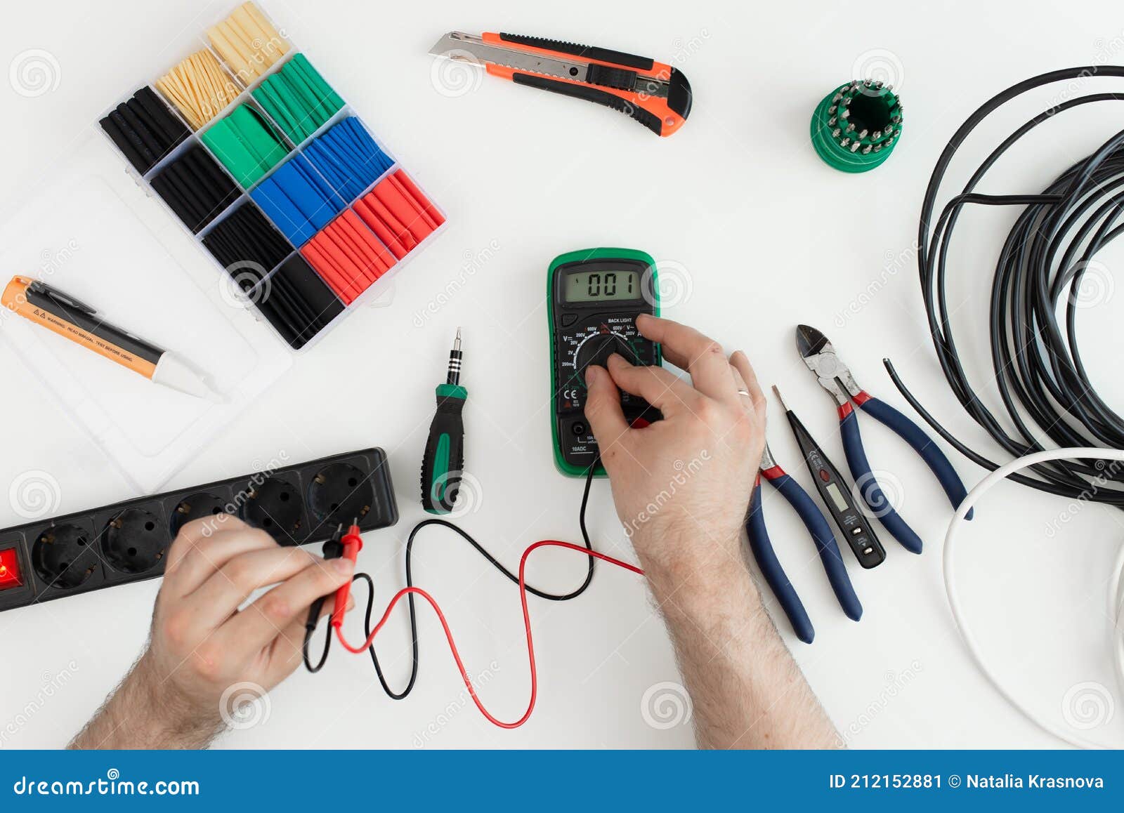 Electrician Checking Socket Voltage with Digital Multimeter Stock Image ...