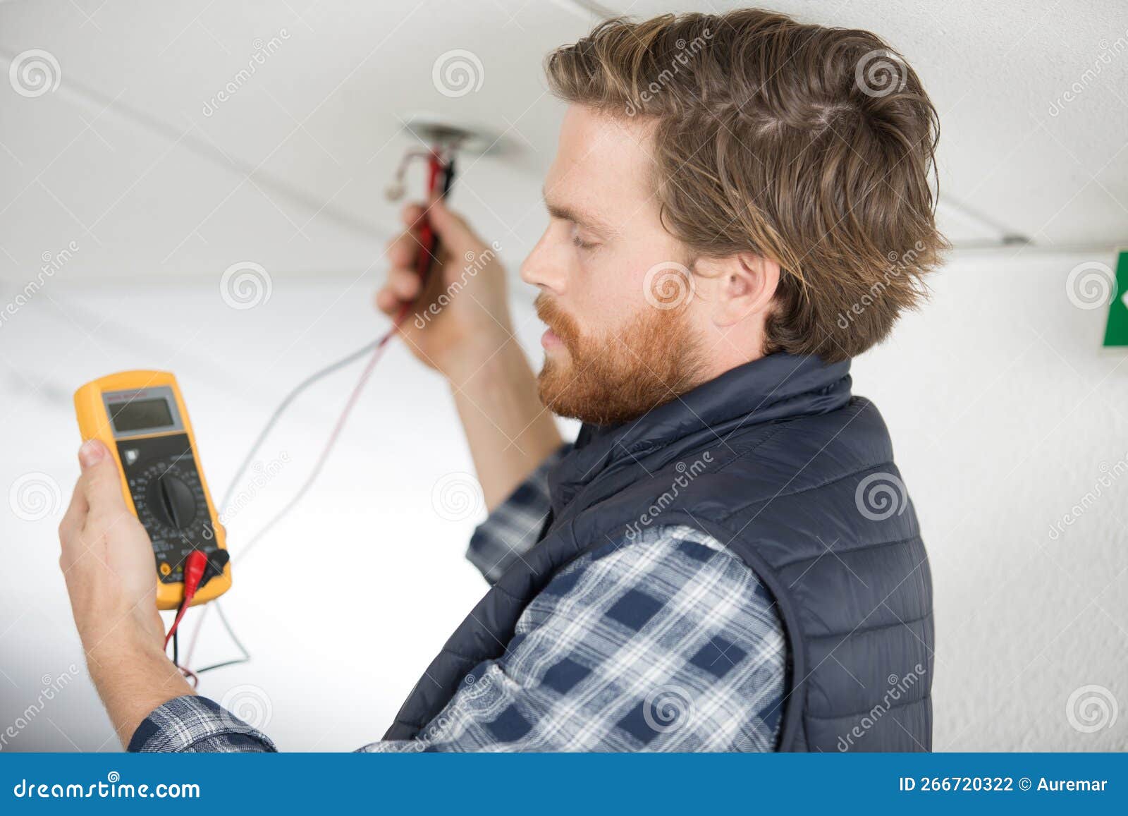 Electrician Checking Wiring in Office Stock Photo - Image of adult ...