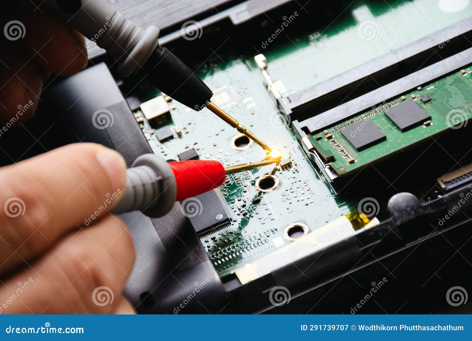 Electrician Checks Electronic Circuit Board by Probe of Digital ...