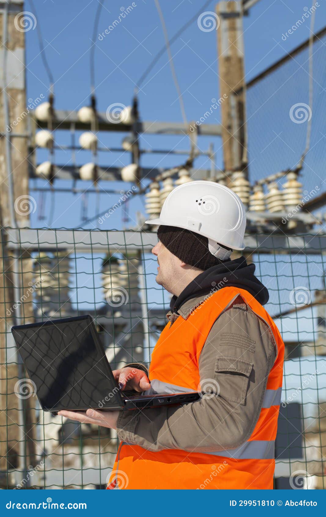 Electrician with computer stock photo. Image of plan - 29951810
