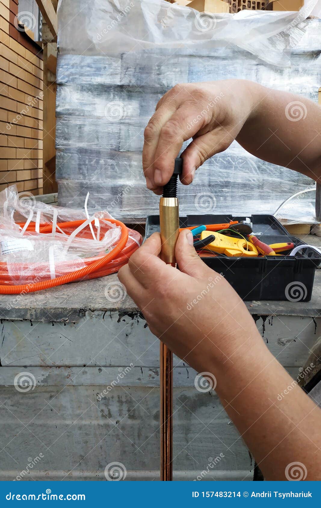 The Electrician Conducts Electrical Work on the Current Grounding of ...