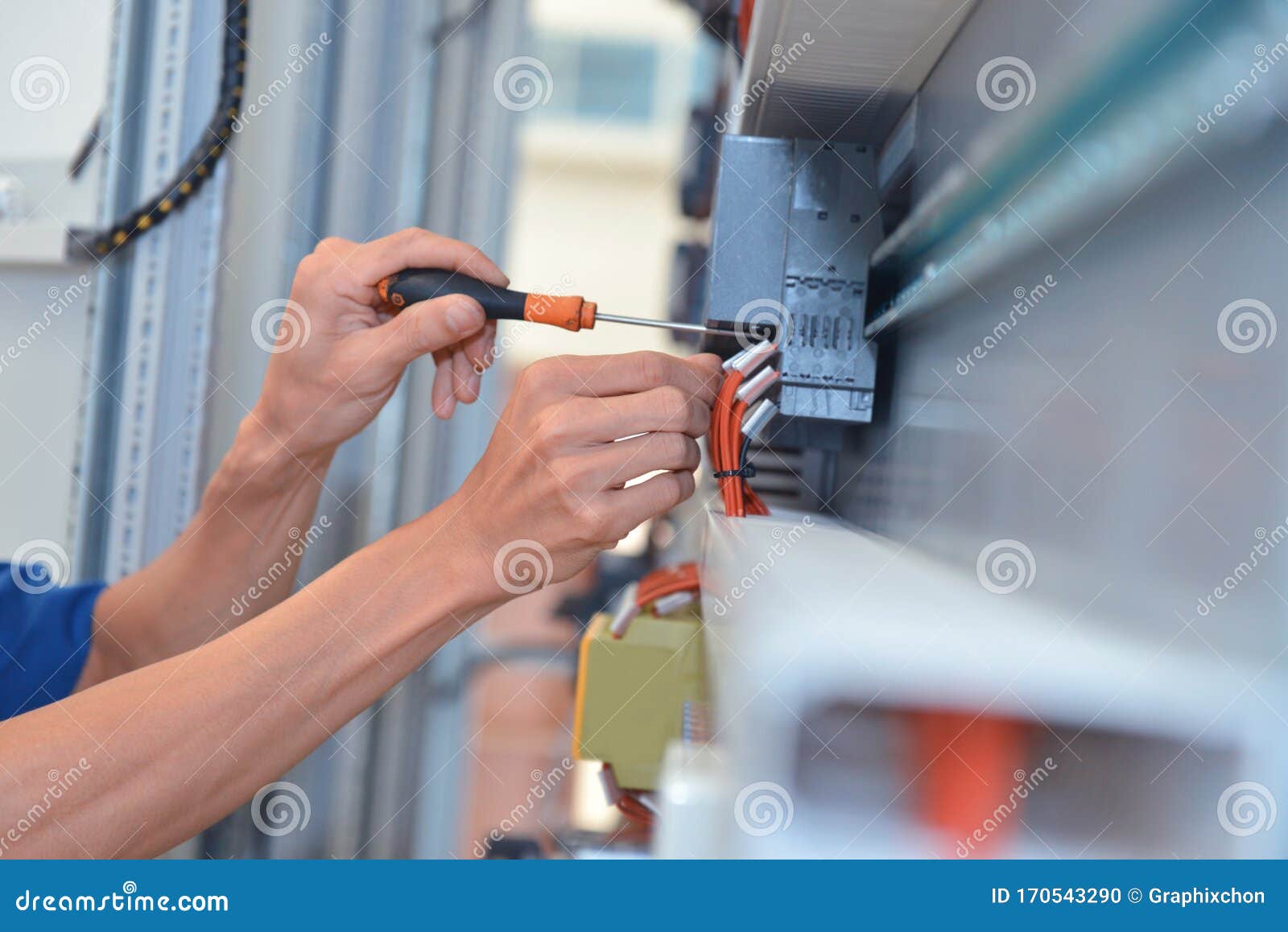 The Electrician is Connecting the Electric Cable Wire Stock Photo ...