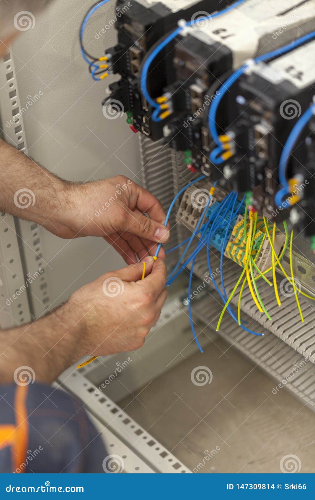Electrician Connecting Wire on the Control Panel Stock Photo - Image of ...