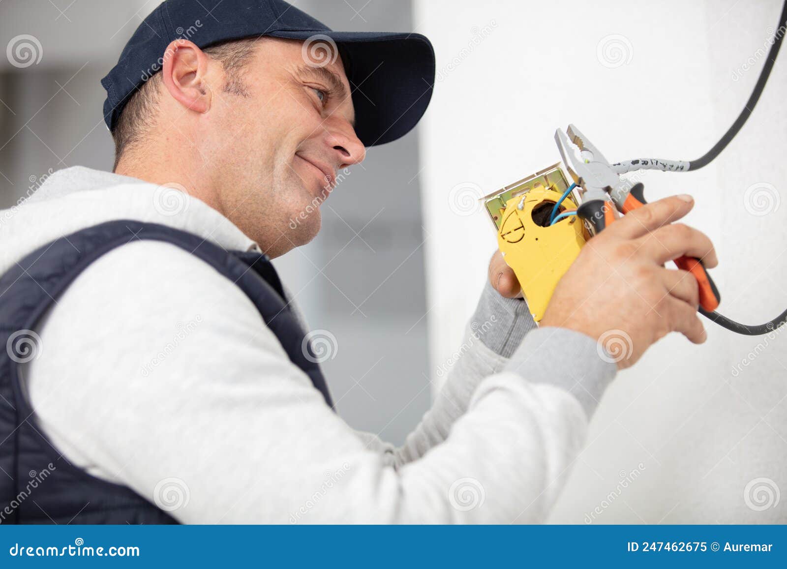 Electrician Cuts Cable at Junction-box Stock Image - Image of ...